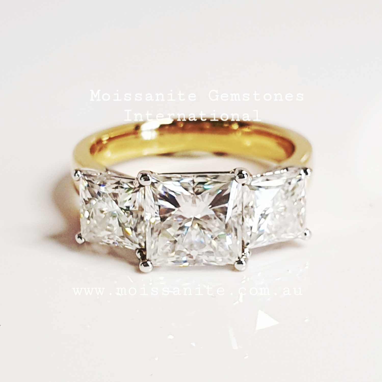 Trilogy Princess cut Engagement Ring | Moissanite Gemstones International